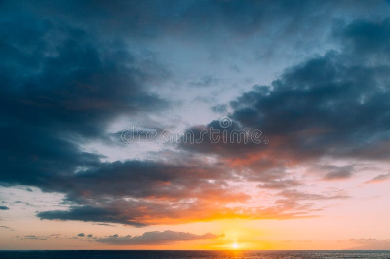 Dramatic sunset over ocean stock photo. Image of summer - 87342024