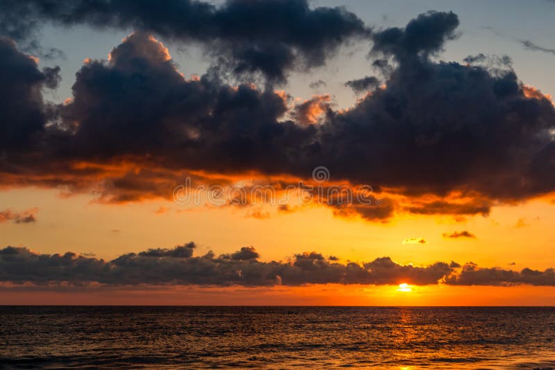 Dramatic Sunset Over Ocean. Sky with Clouds Stock Photo - Image of dawn ...