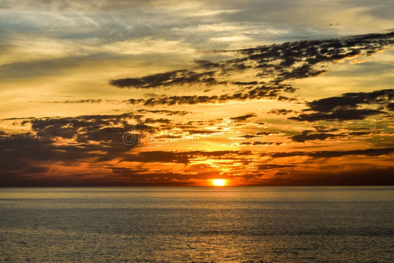 Dramatic Sunset Over the Ocean Stock Photo - Image of ocean, coastline ...