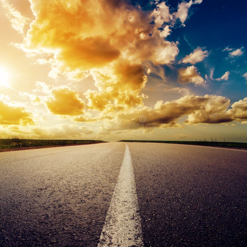 Dramatic sunset over road stock photo. Image of drive - 39058324