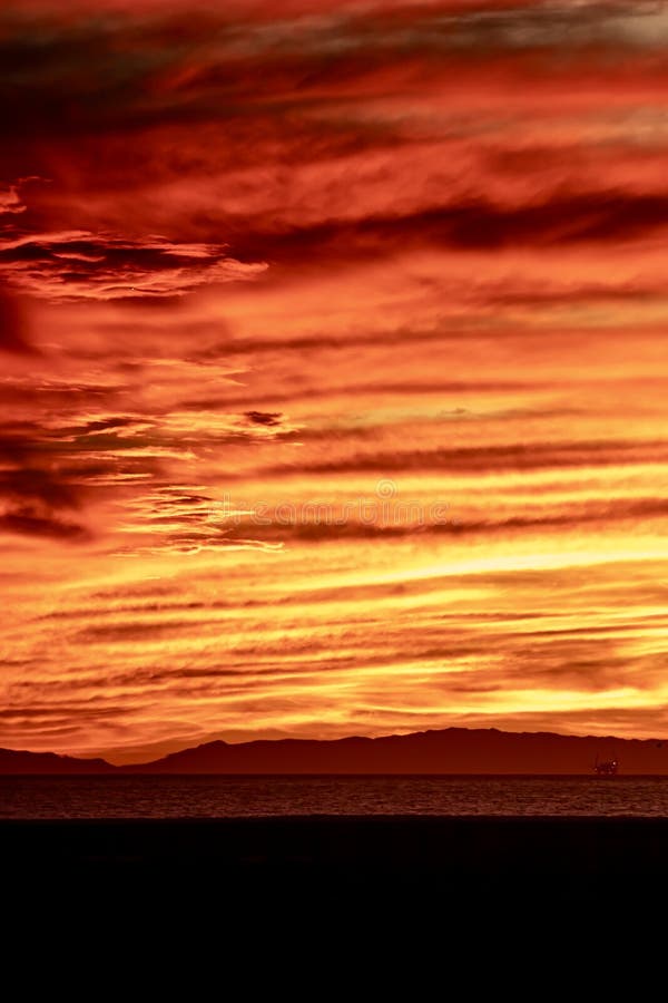 Dramatic Sunset Over the Sea Stock Image - Image of dark, island: 188463093