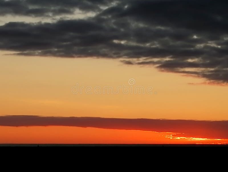 Dramatic Sunset Over the Sea. Stock Photo - Image of drama, sunset ...