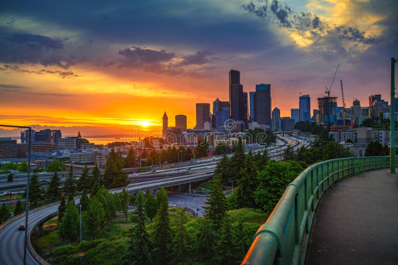Dramatic Sunset Over Seattle Skyline with Highway in Foreground Stock ...