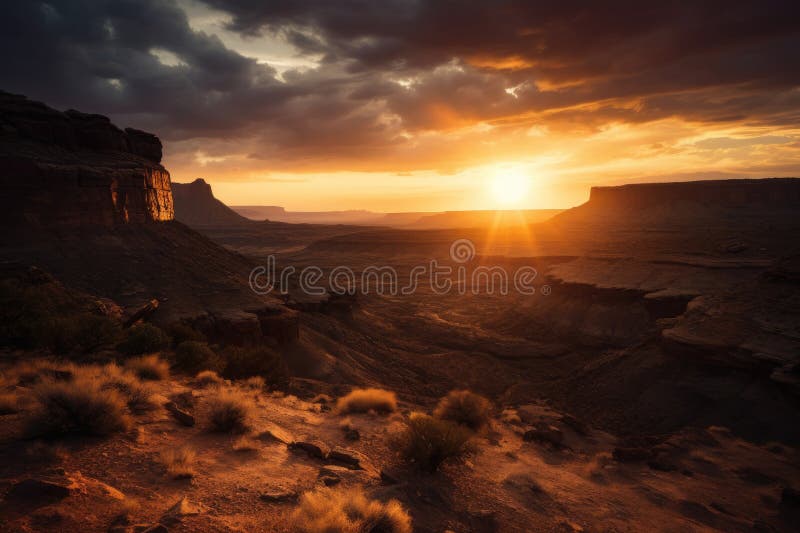 Dramatic Sunset Over Towering Mesas in Canyon Stock Image - Image of ...