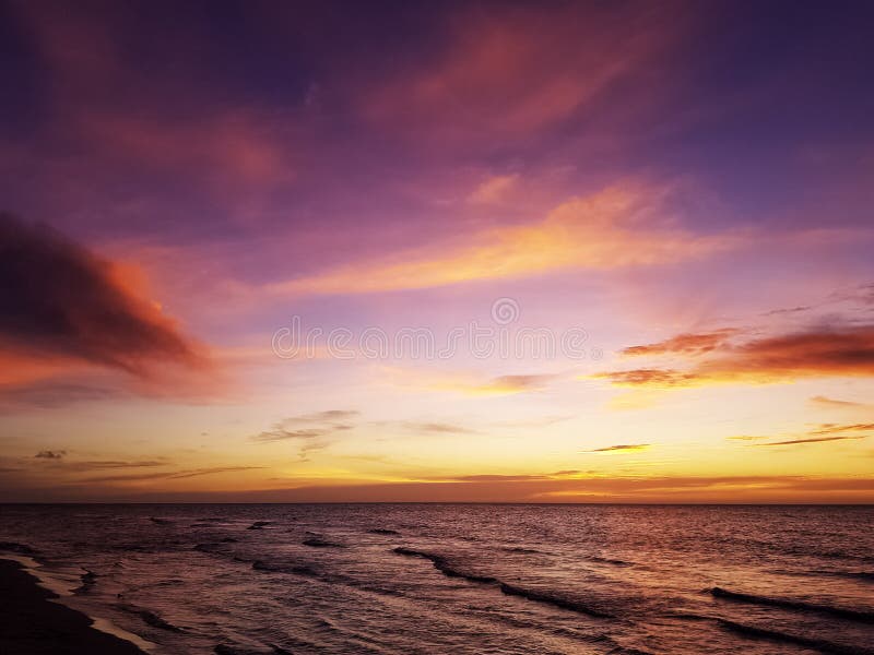 Dramatic Sunset Over the Water on Cuban Beach Stock Photo - Image of ...