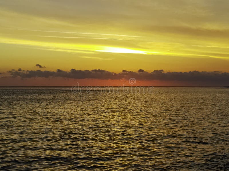 Dramatic Sunset Over the Water on Cuban Beach Stock Photo - Image of ...
