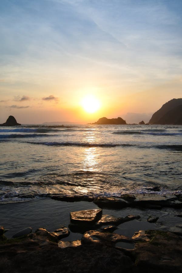 Dramatic Sunset at Papuma Beach in Jember, East Java, Indonesia. Stock ...