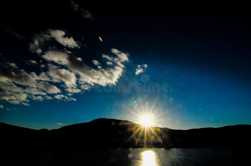 Dramatic Sunset Rays stock image. Image of evening, high - 217240351