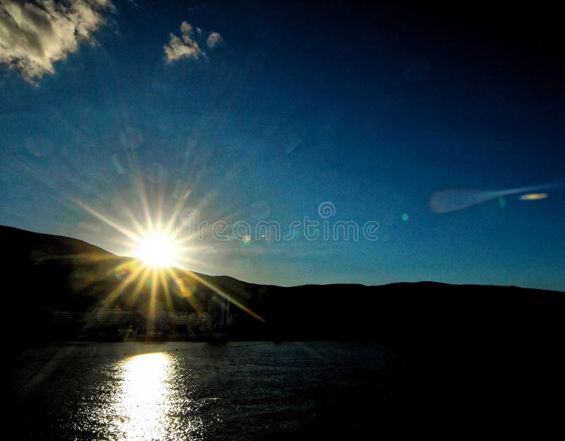 Dramatic Sunset Rays stock photo. Image of sunset, travel - 141919772