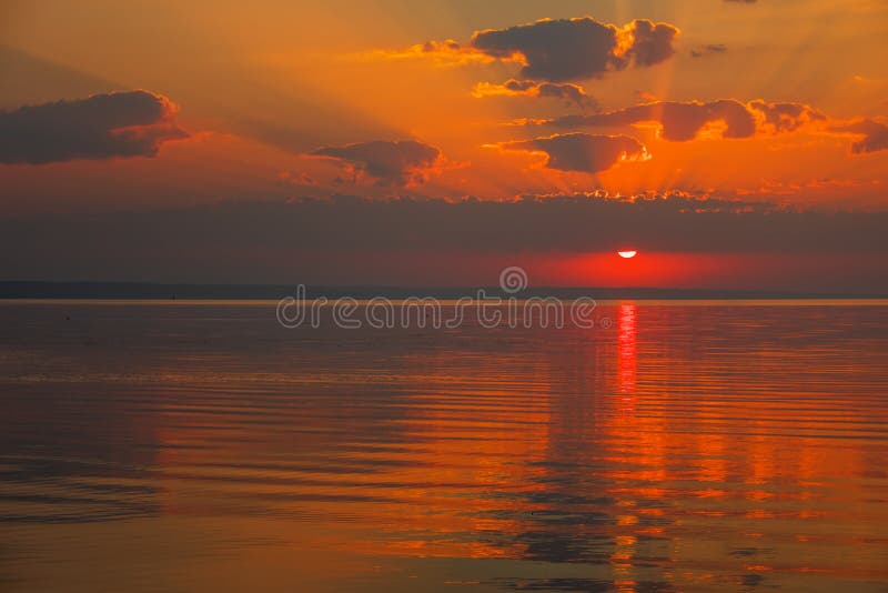 Dramatic Sunset Sky with Clouds Over Lake. Stock Image - Image of ...