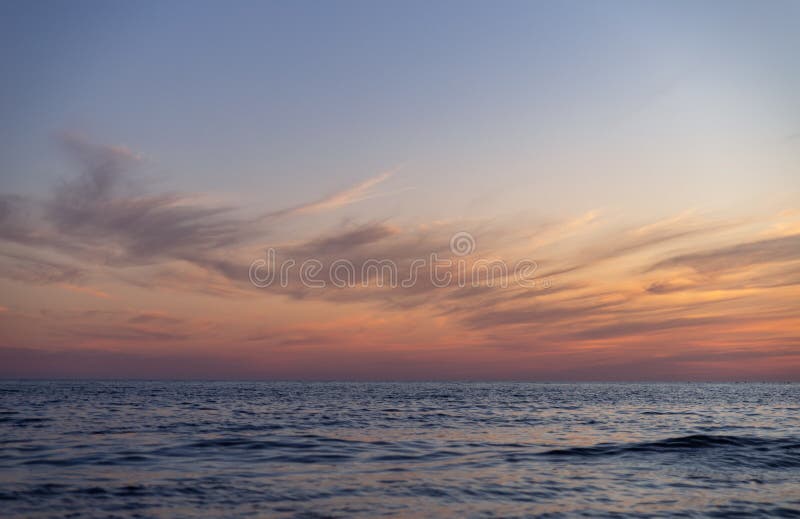 Dramatic Sunset Sky with Clouds. Dramatic Sunset Over the Sea Stock ...