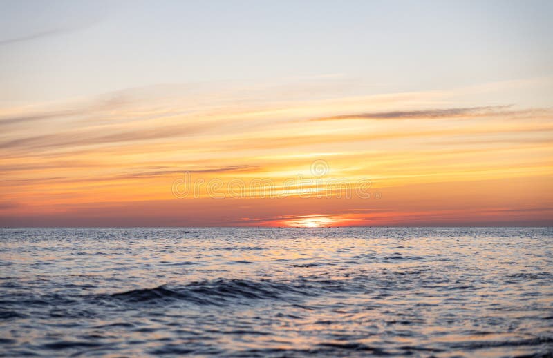 Dramatic Sunset Sky with Clouds. Dramatic Sunset Over the Sea Stock ...