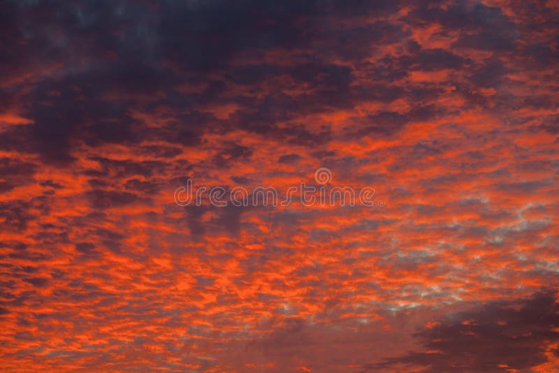 Dramatic Sunset Sky with Clouds Painted in Vivid Red and Orange Tones ...