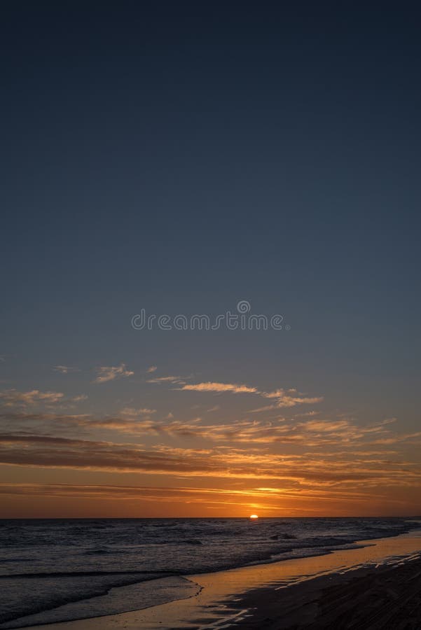 Portrait of Dramatic Sunset Sky with Clouds and Reflection on the Sea ...