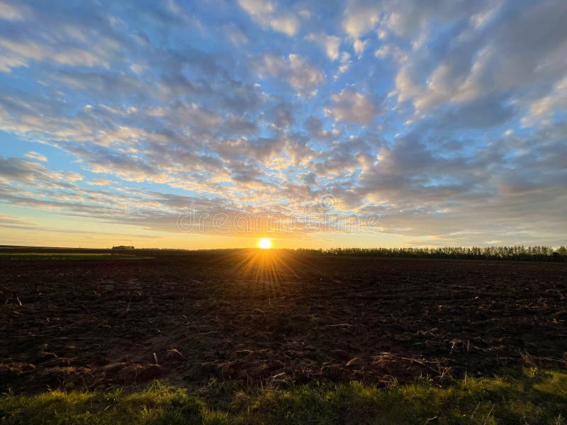 Dramatic Sunset Sky with Clouds. Spectacular Sunset Over the Field ...