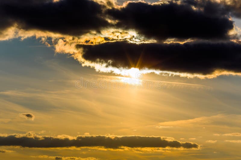 Dramatic Sunset Sky with Clouds and Sun Rays Stock Photo - Image of ...
