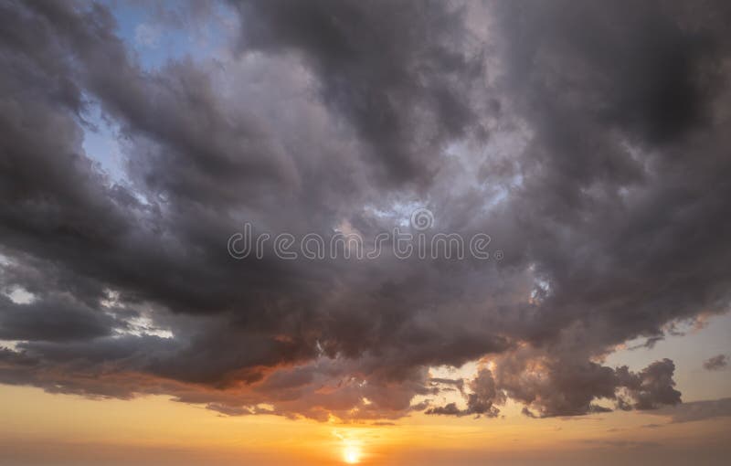 Dramatic Sunset Sky Covered with Colorful Yellow Clouds. Panoramic ...