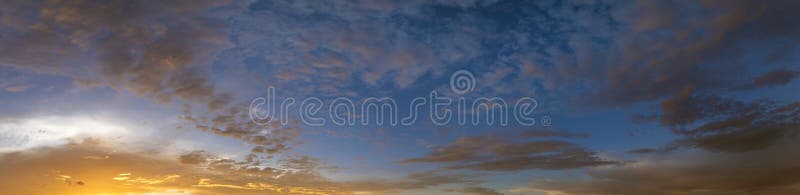 Dramatic Sunset Sky Covered with Colorful Yellow Clouds. Panoramic ...
