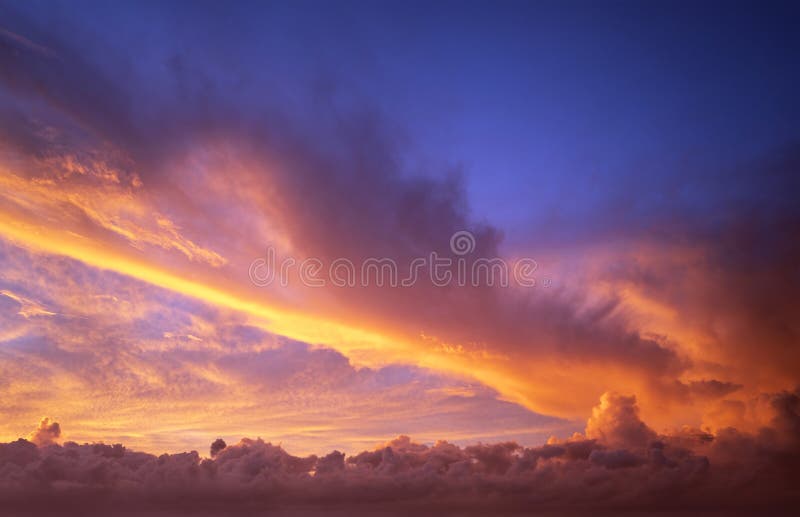 Dramatic Sunset Sky Covered with Colorful Yellow Clouds. Panoramic ...