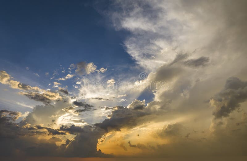 Dramatic Sunset Sky Covered with Colorful Yellow Clouds. Panoramic ...