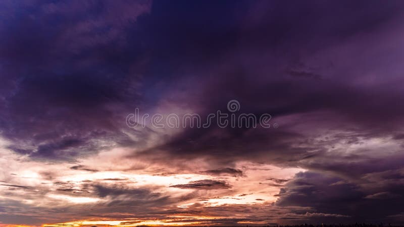 Dramatic Sunset in the Sky through Cumulus Storm Clouds, Stock Photo ...