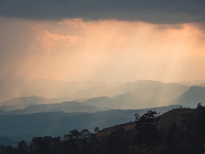 Dramatic Sunset Sky Featuring a Large Rain Cloud in the Foreground ...