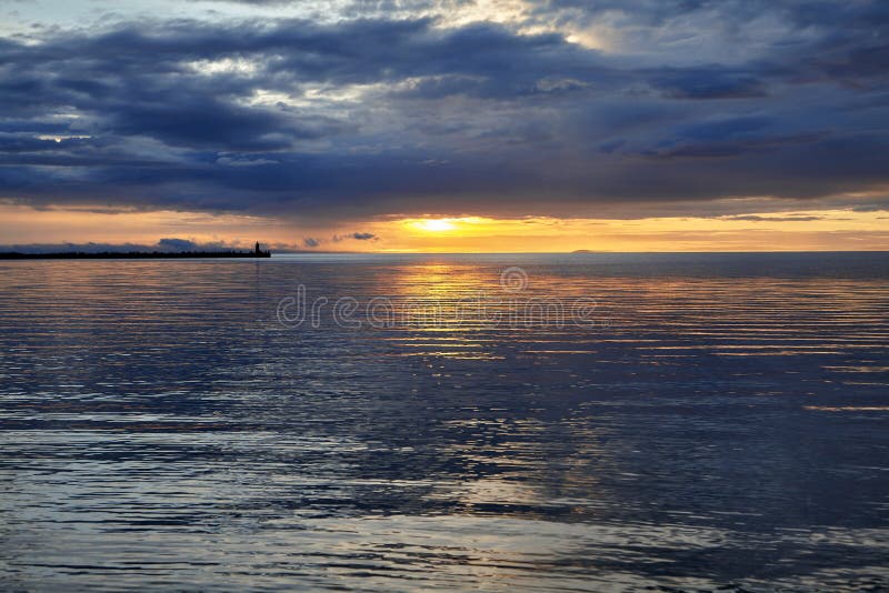 Dramatic Sunset with Thunderclouds before the Storm. Sea Pier with a ...