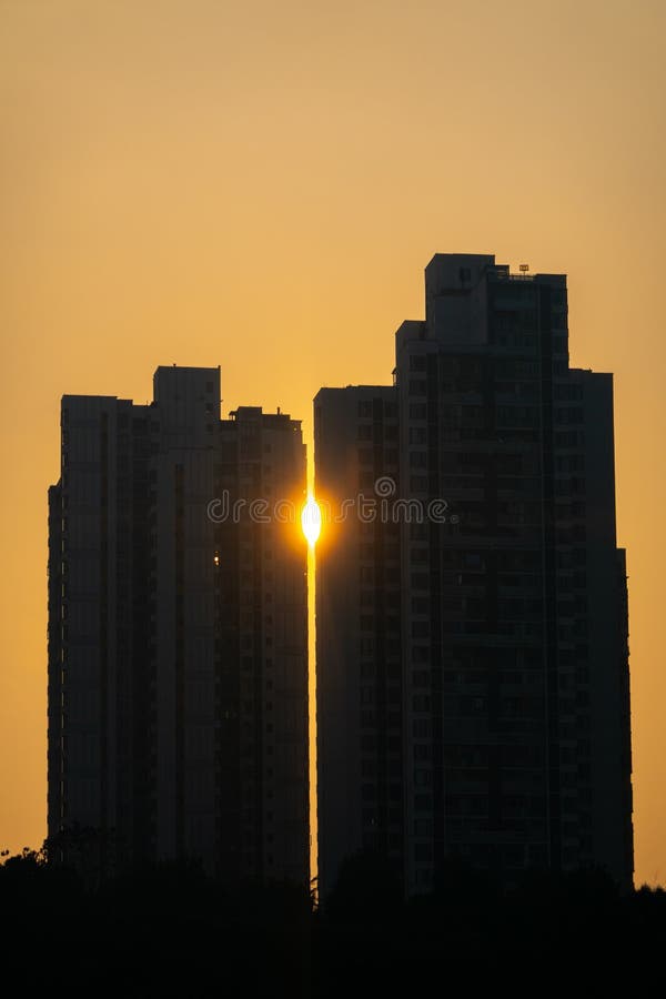 Dramatic Sunshine between Two Buildings Stock Image - Image of black ...
