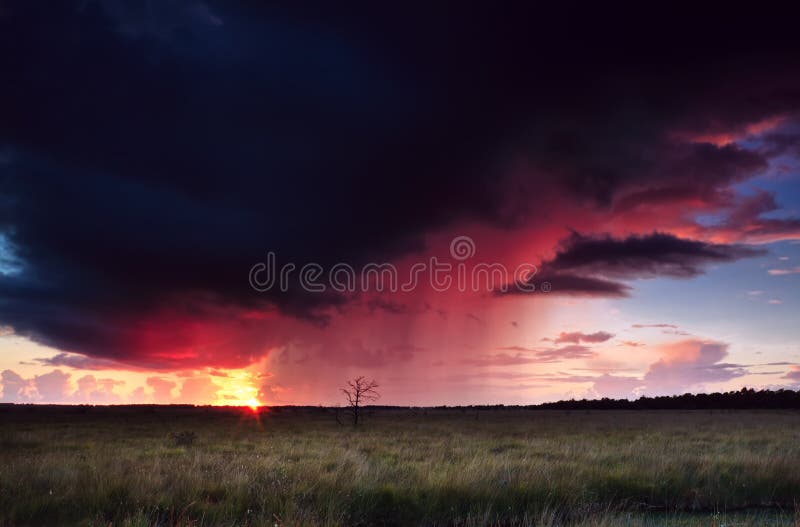 Dramatic Thunderstorm at Sunset Stock Image - Image of sundown, scenery ...