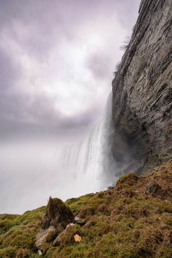Dramatic Unique View Behind a Powerful Roaring Waterfall Stock Image ...
