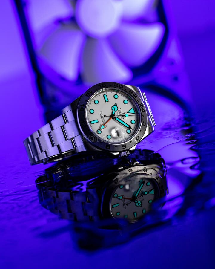 Dramatic Vertical Shot of the Luxury Rolex Explorer on the Wet Surface ...