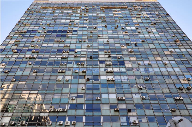 Dramatic View of Old Glass Building Facade with Air Conditioning Units ...