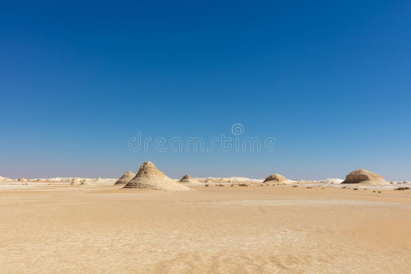 Dramatic White Desert Landscape with a Blue Sky Background. Stock Photo ...
