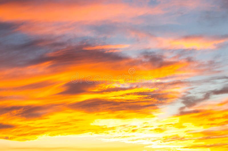 Dramatic Yellow and Orange Colored Sunset Cloudscape for Background or ...