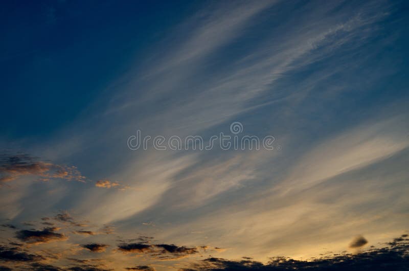 Dramatic Yellow and Orange Sunset Sky with Clouds and Sun Rays Stock ...