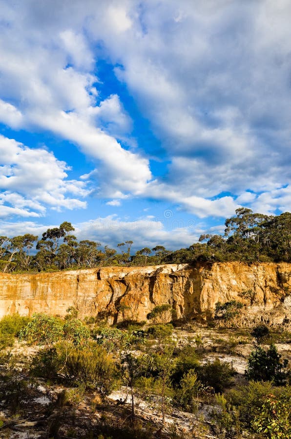 Dramatic Yellow and Orange Sunset Sky with Clouds and Sun Rays Stock ...