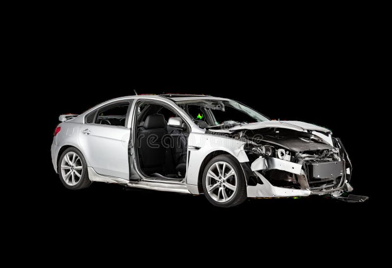 A Dramatically Crashed Silver Sedan with Open Doors and a Visible ...