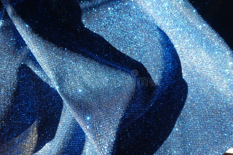 Draped Shiny Electric Blue Lurex Fabric Stock Photo - Image of pleats ...