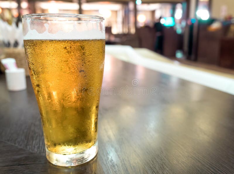 Draught beer in restaurant stock photo. Image of drink - 59000092