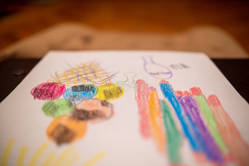 Draw with Colored Pencils on a White Sheet of Paper. Stock Photo ...