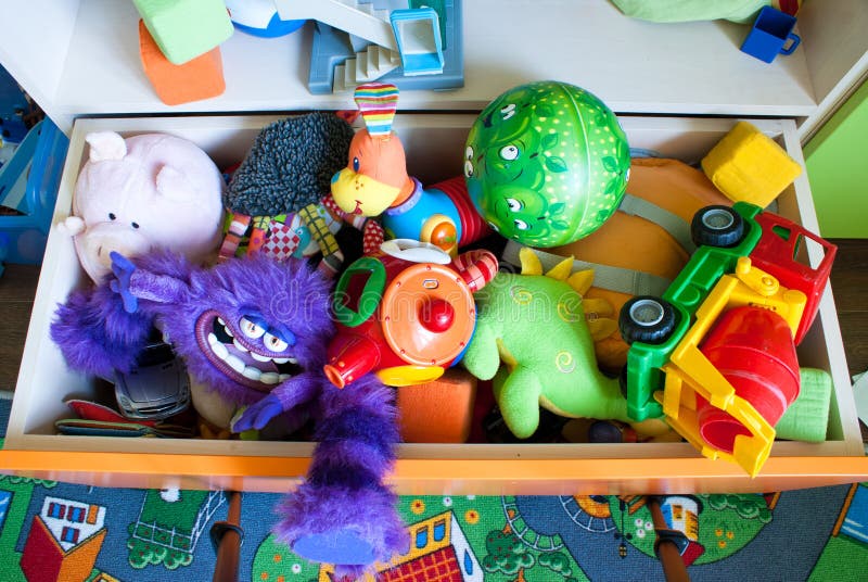 Drawer with different toys stock image. Image of happy - 52199059