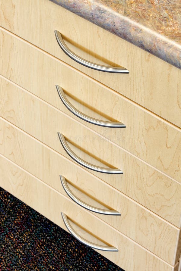 Drawer Pulls on the Front of Cabinets. Stock Photo - Image of maple ...
