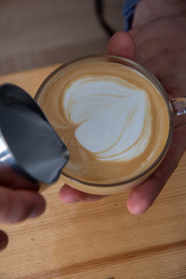 Drawing on cappuccino stock photo. Image of cappuccino - 208085186