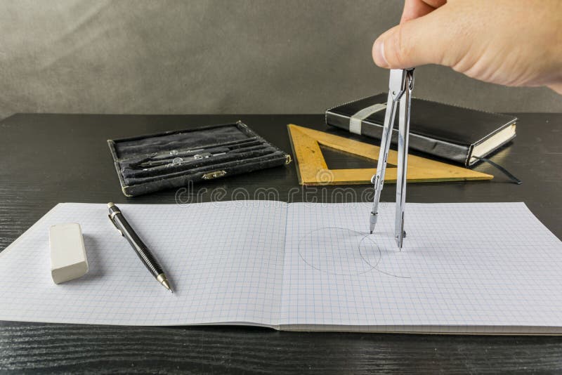 Drawing a Circle Using a Compass in a Checkbook. Stock Photo - Image of ...