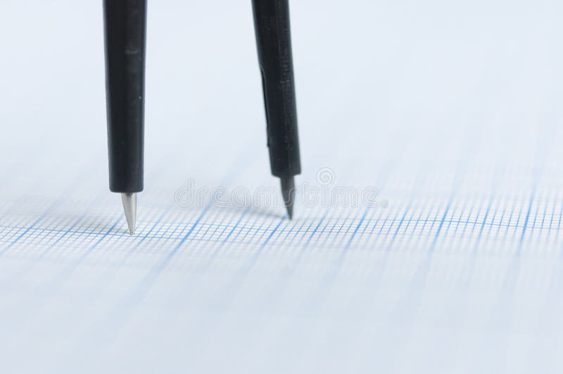 Drawing a Compass on Graph Paper with Copy Space for Presentation Stock ...