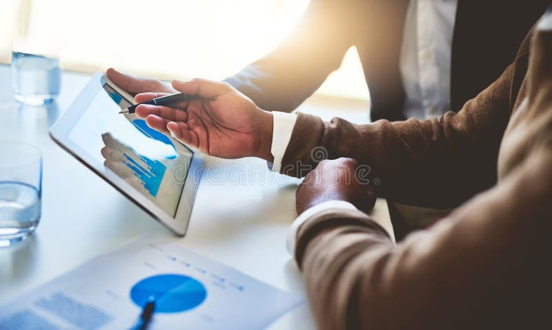 Drawing Conclusions from the Data. Closeup Shot of Two Unidentifiable ...