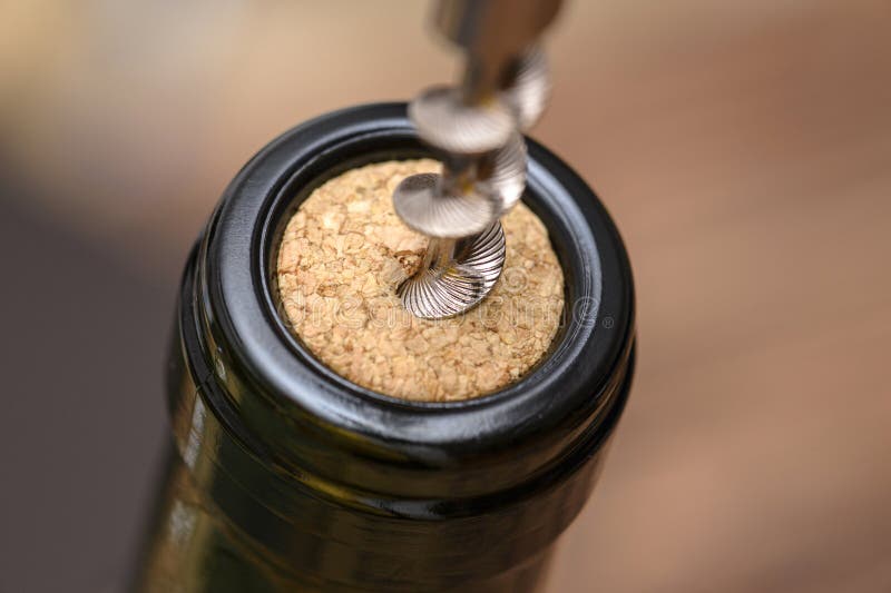 Drawing Corks from Bottle of Wine with Corkscrew Stock Photo - Image of pull, celebrate: 277453054