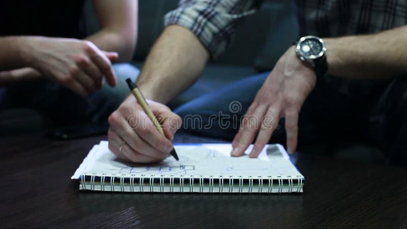 Drawing Draft. Hands of Young People Who Draw a Draft with Pen on ...