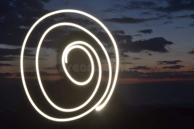 Drawing by the Light of a Lantern in a Circle in the Night Sky Stock ...