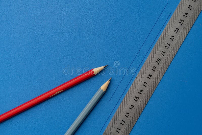 Drawing a Line on a Color Surface with a Ruler and a Pencil Stock Image ...